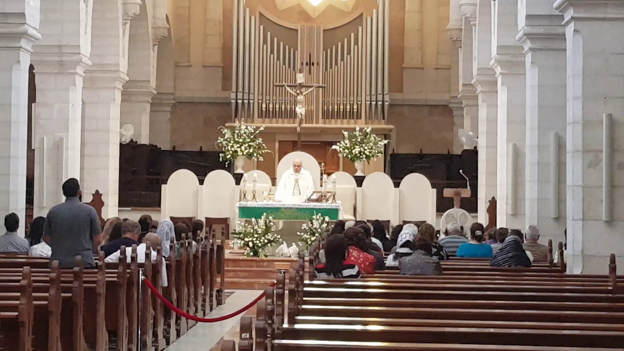 Mass in Arabic in the Roman Catholic Church at the place where Jesus ...