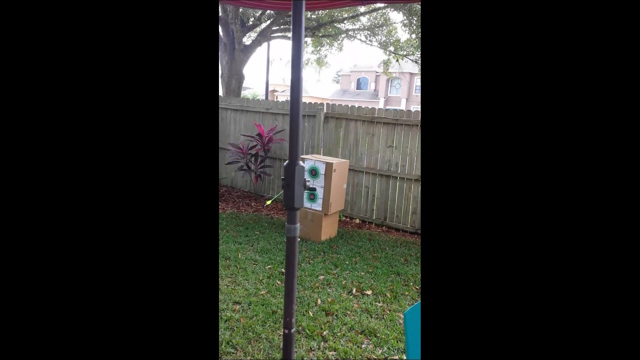 Jackson shooting his bow and arrow - YouTube