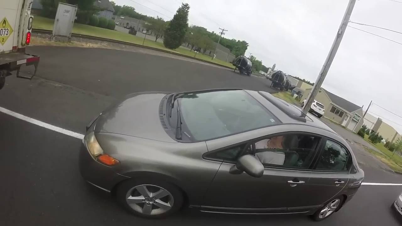 Instant Karma | Car bullying motorcyle during a lane merge - YouTube