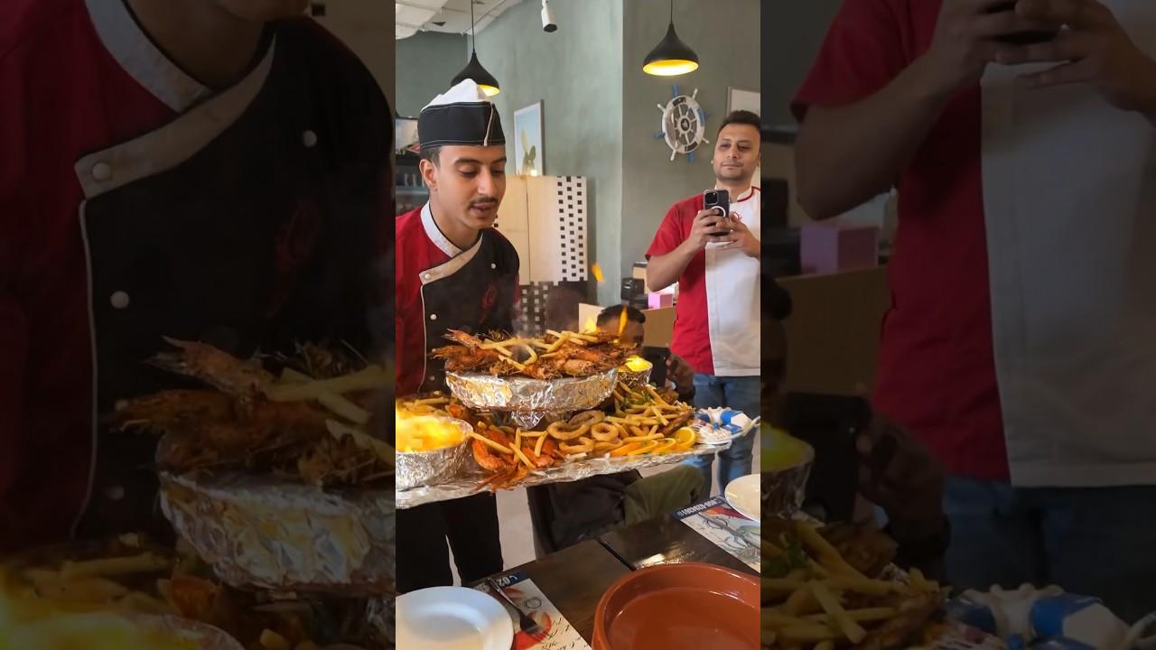 The flaming volcano seafood platter 😎 - YouTube