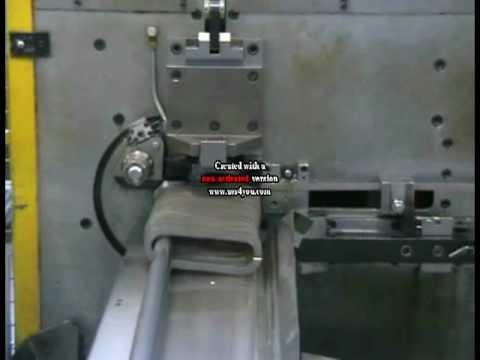 Strip on edge coil winding.mpg - YouTube