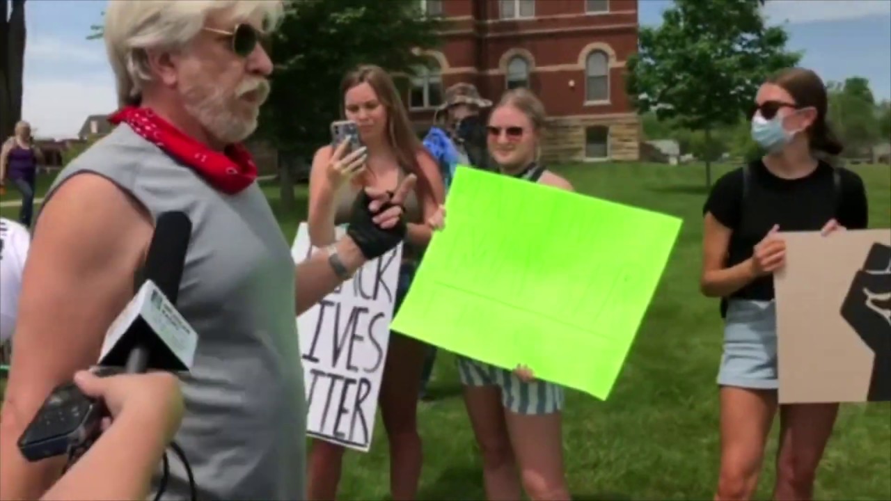 Counter protestor faces off with police brutality protestors in Howell ...