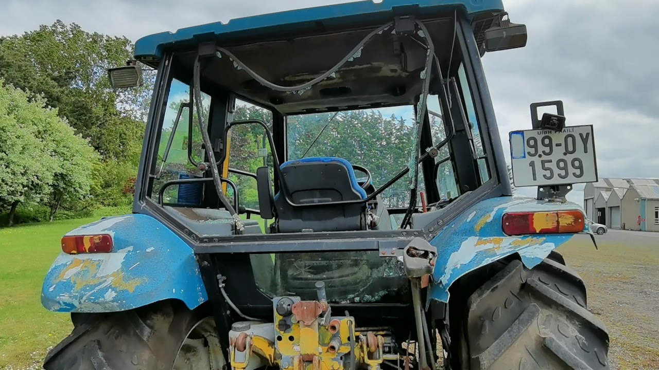 1999 New Holland TL70 Tractor For Auction - YouTube