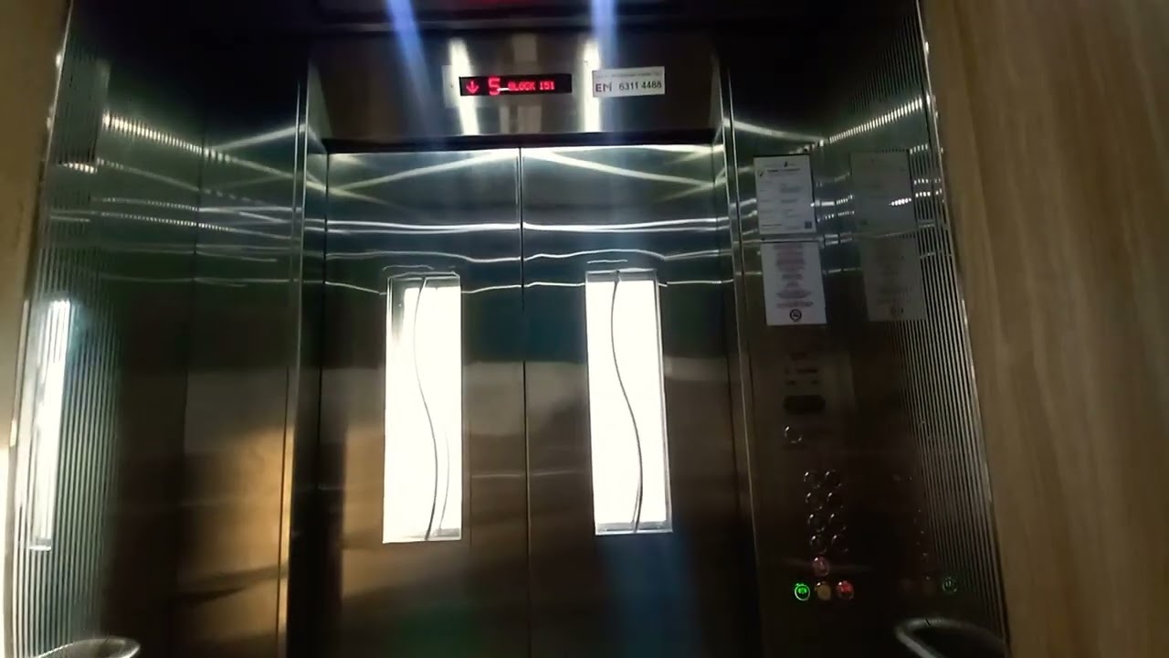 EM Shenyang Brilliant Elevator at Siglap Community Club. - YouTube