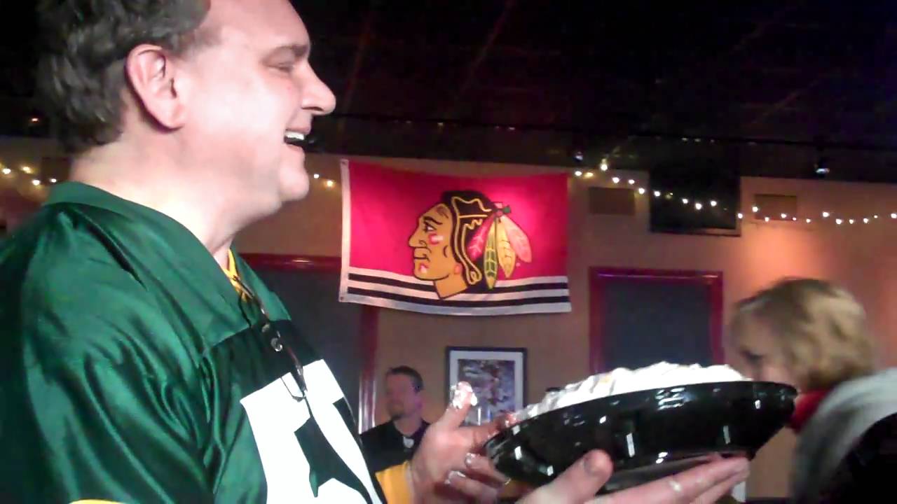Packer Fan puts Pie in Bear's Fans Face - YouTube