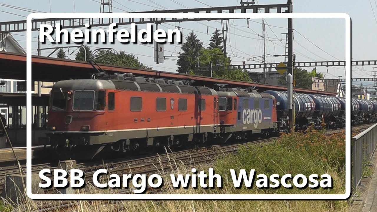SBB Cargo with fast freight train through Rheinfelden! - YouTube
