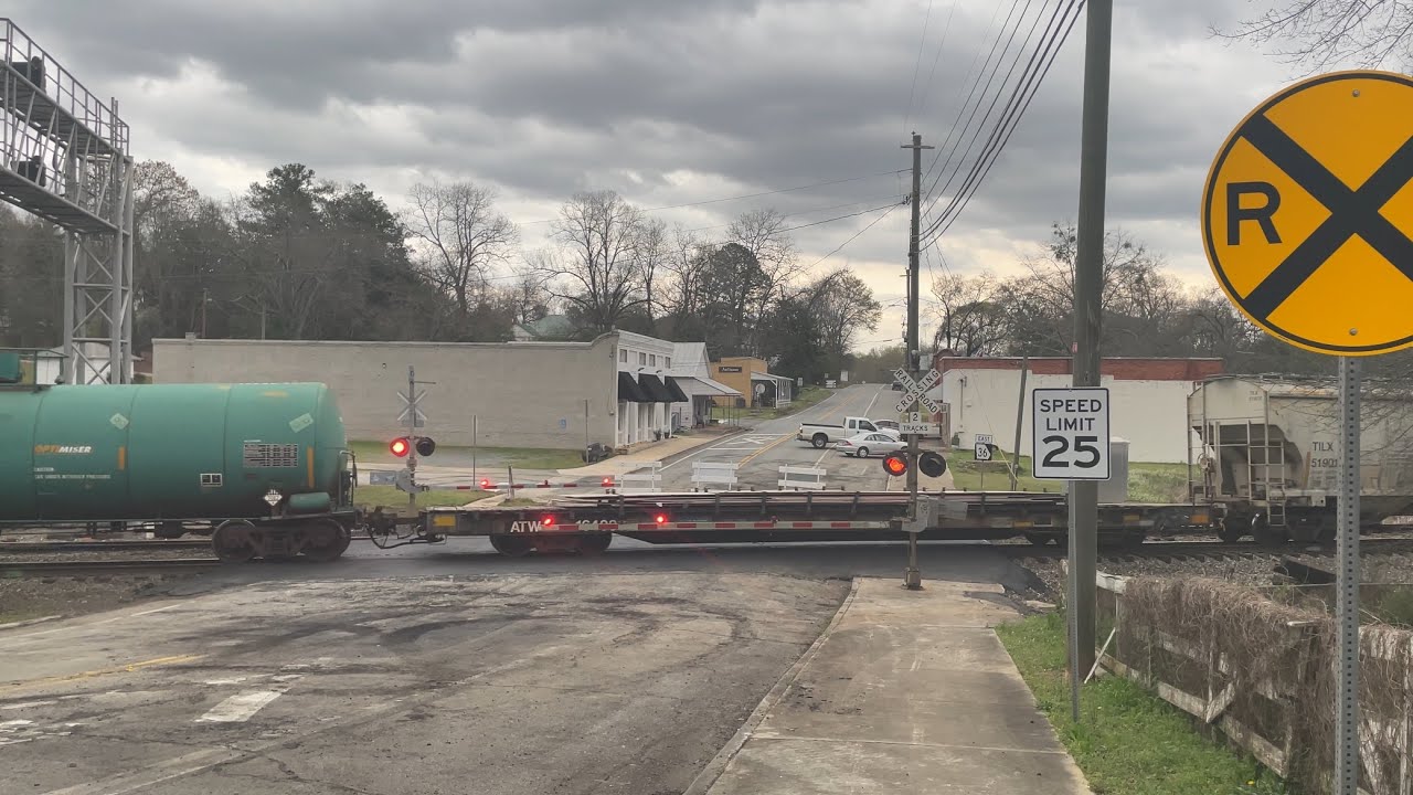 CSX #982 Mixed freight train on 1st Street in Woodland, GA (part 1 of 2 ...