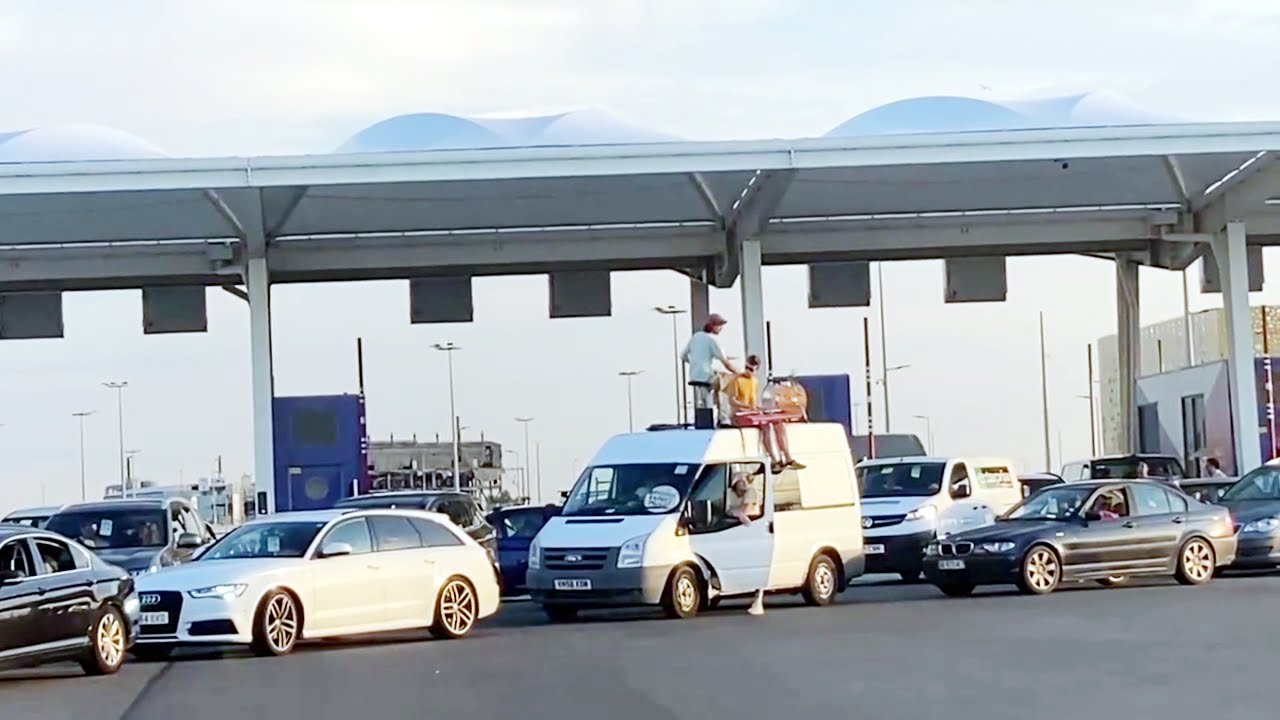 Band stuck in Calais queue perform surprise gig - YouTube