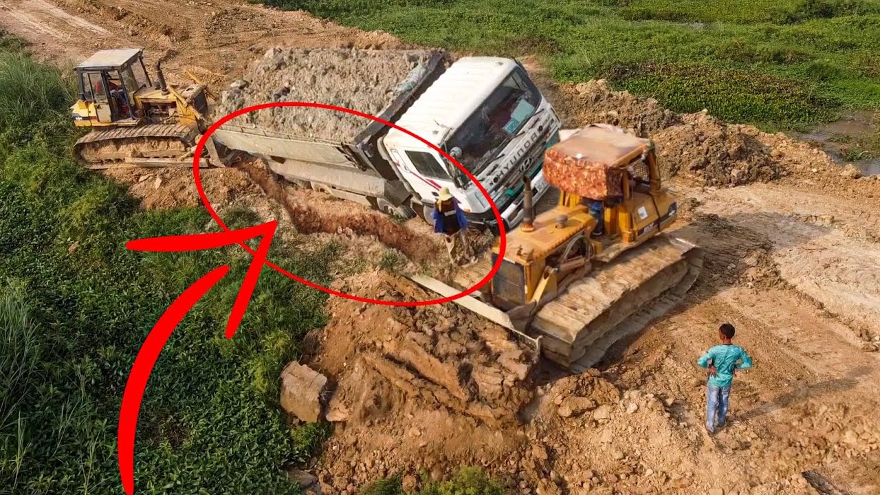 25T Trucks Fails And Stuck Wheel. Bulldozers Gryna Help - YouTube