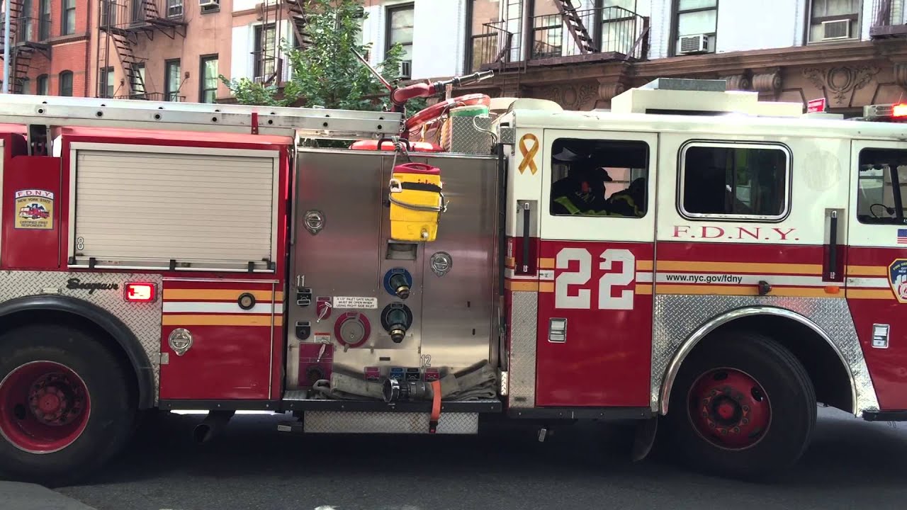 FDNY ENGINE 22 RETURNING TO QUARTERS ON E. 85TH ST. ON THE EAST SIDE OF ...