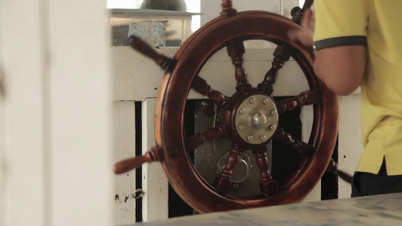 close up of hand on ship rudder - YouTube