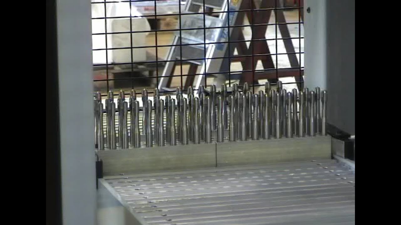 UEC - Chamfer grinding UEC with portal loader - YouTube