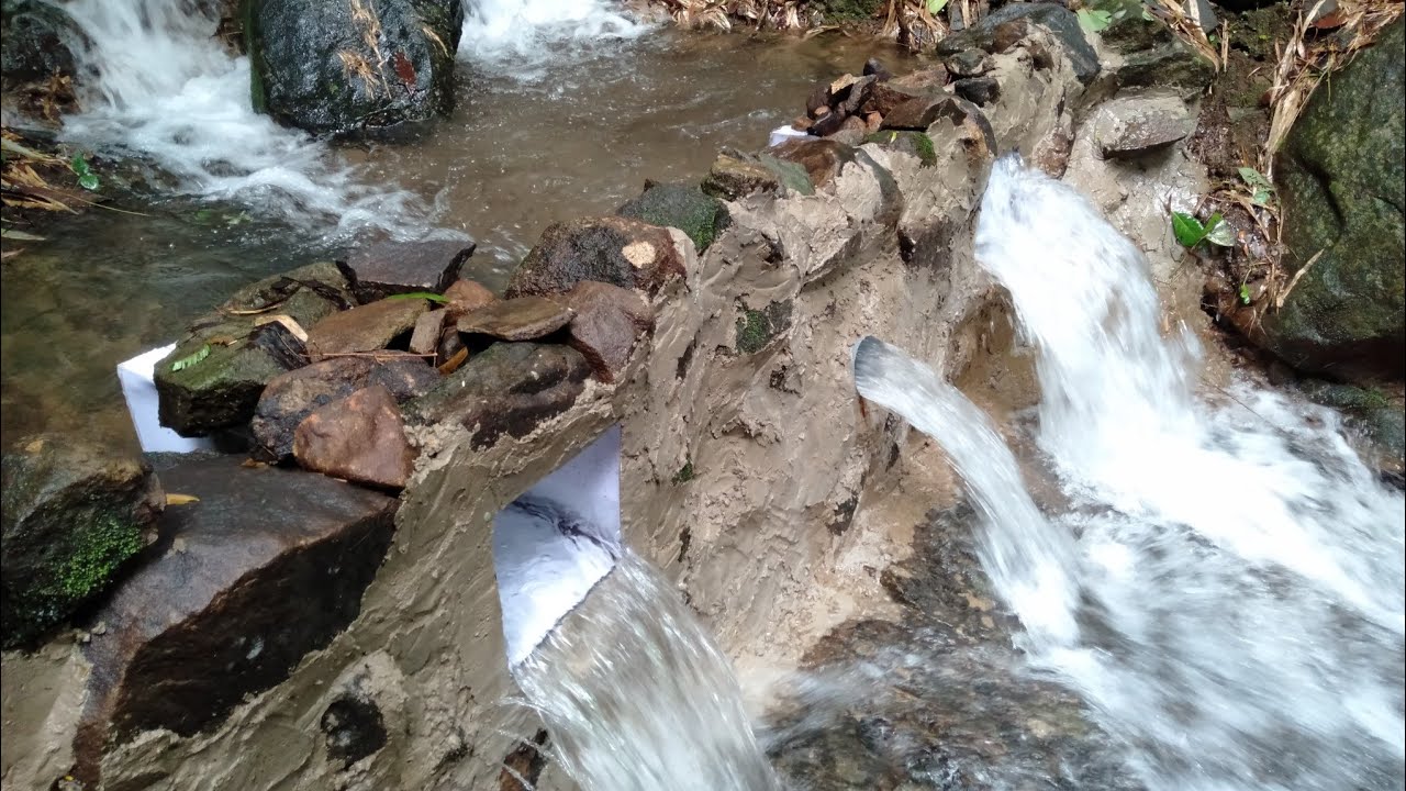 mini dam construction || primitive technology: build a stone dam || dam ...