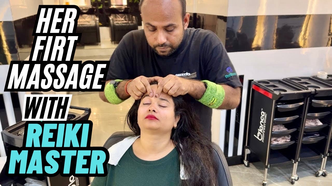 Reiki master performing head massage on female client, Happy with her ...