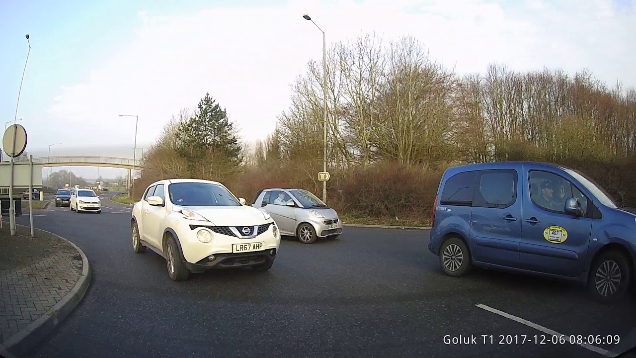 LR67AHP Mobile texting and driving M40 Denham roundabout Uxbridge ...