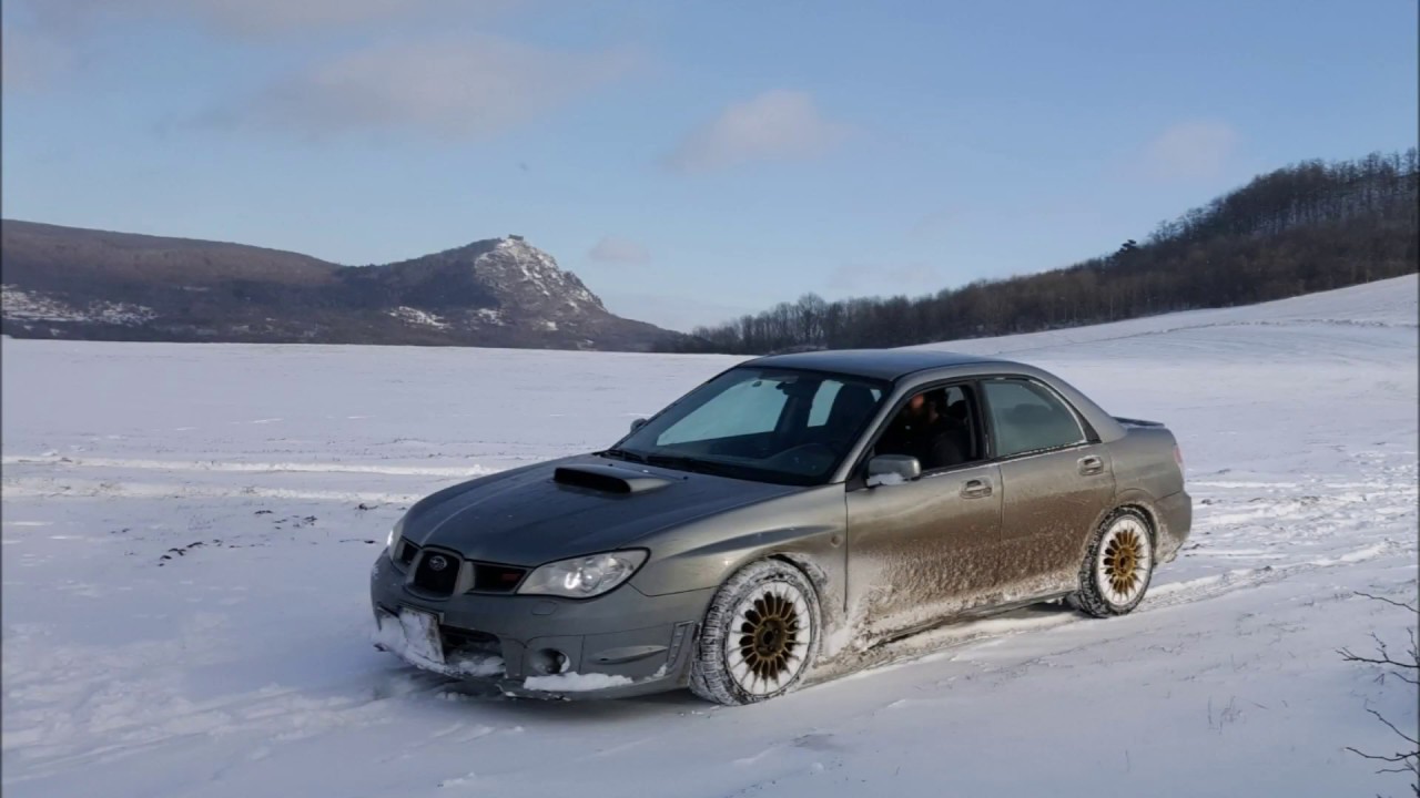 Subaru Impreza WRX STI having fun in winter - YouTube