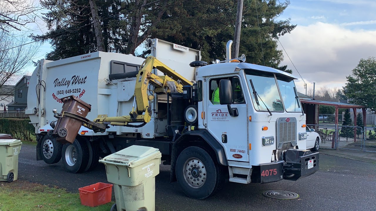 Valley west Peterbilt 320 Wayne Curbtender garbage truck!! - YouTube