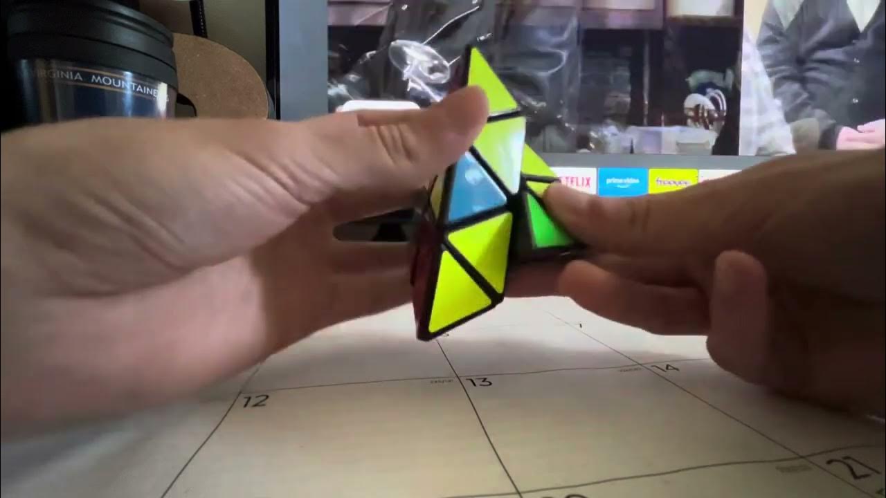 How to solve a pyraminx (Rubik’s cube) - YouTube