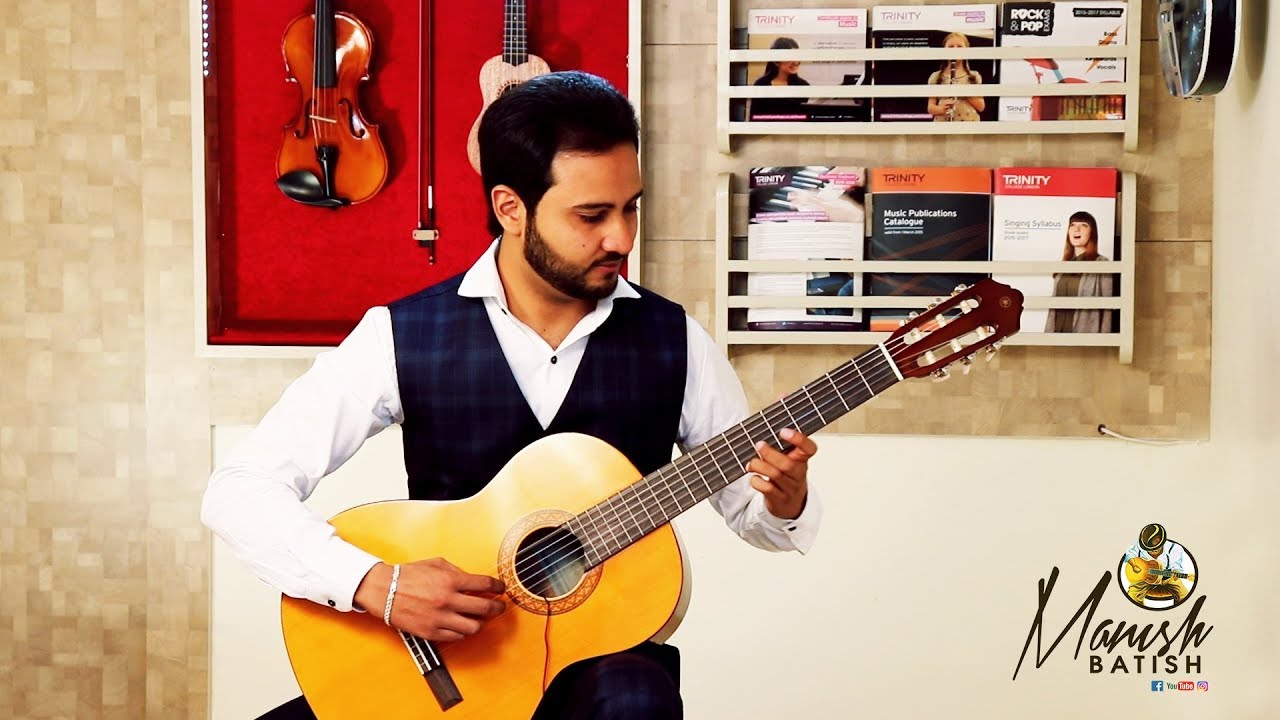 Desi FingerStyle Guitarist - Manish Batish - YouTube
