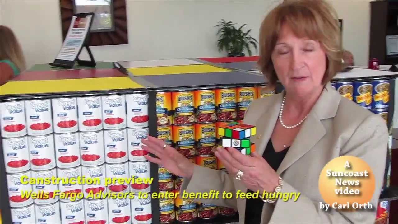 Canstruction preview 850 cans in Rubik's cube - YouTube