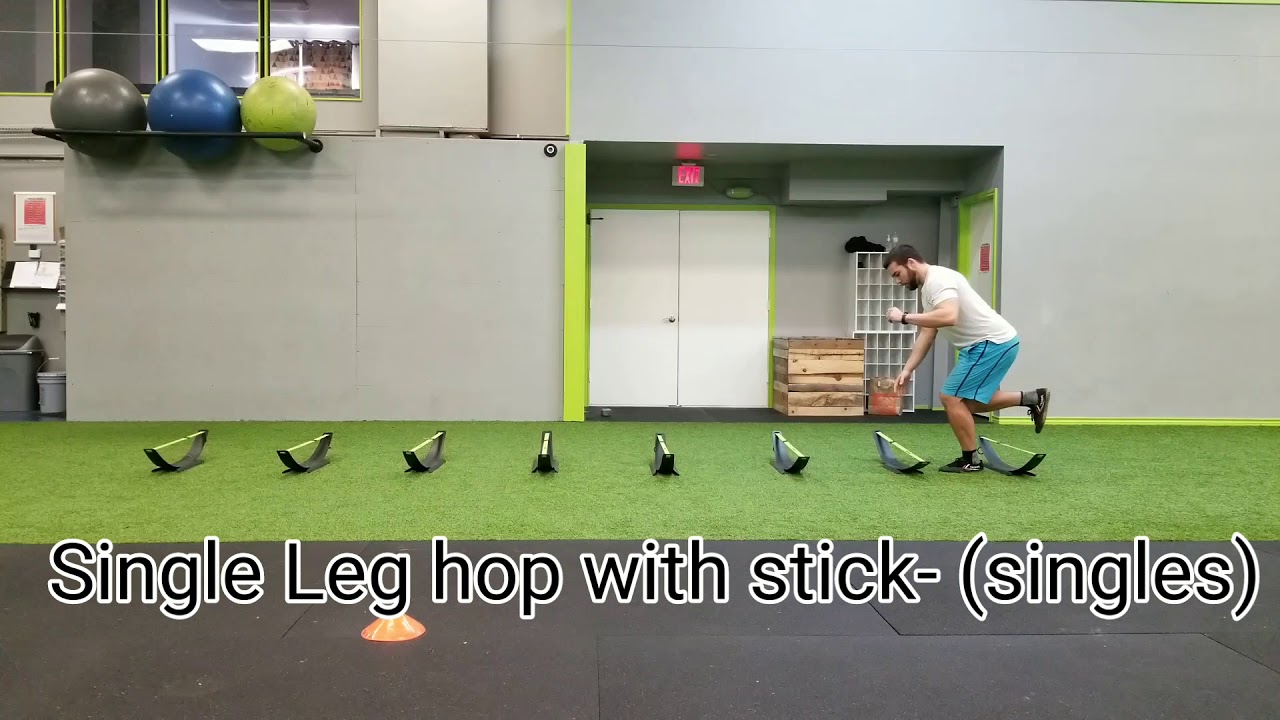 Single Leg Hop with stick (singles) - YouTube