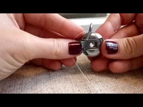 4# Mettre la canette dans la machine et remonter le fil (Singer Decorative)