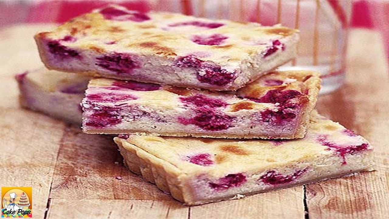 Raspberry and white chocolate traybake - YouTube