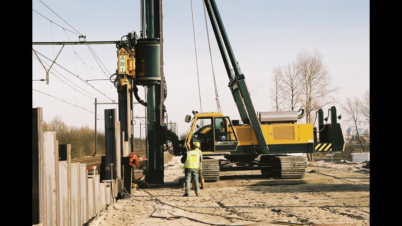 Woltman 55DR Sheet pile pressing by Sterk - YouTube