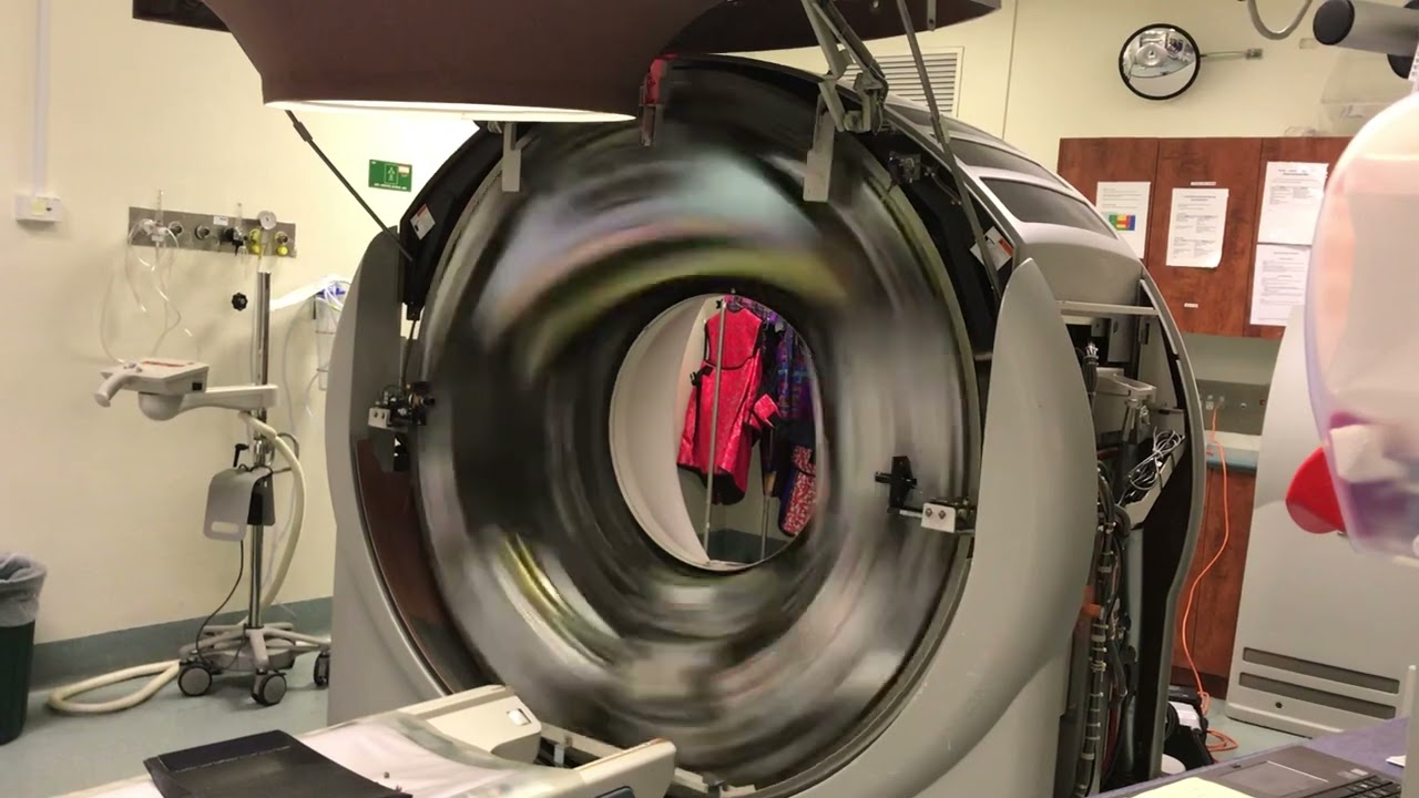 Radiologist films inside of a CT scanner spinning at full speed - YouTube