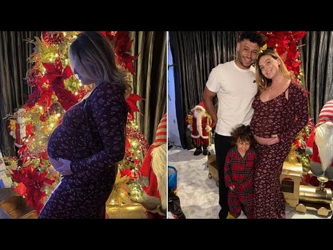 Perrie Edwards cradles her baby bump in sweet Christmas snaps as she ...
