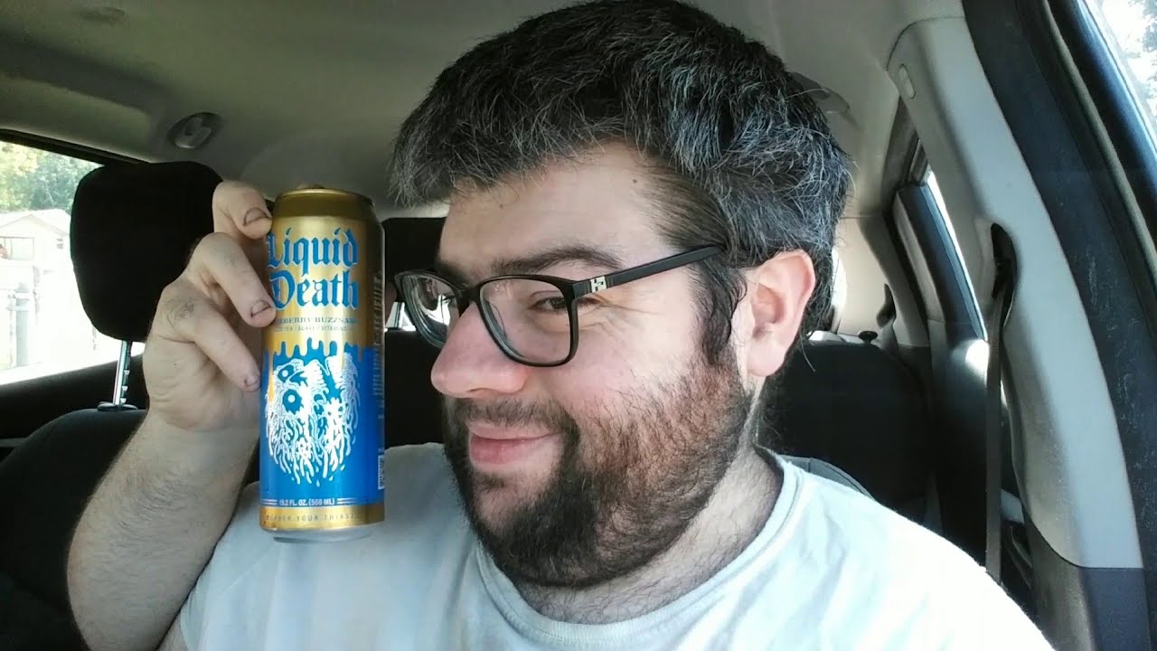 Deadcarpet Tries The Blueberry Buzzsaw Liquid Death Iced Tea - YouTube