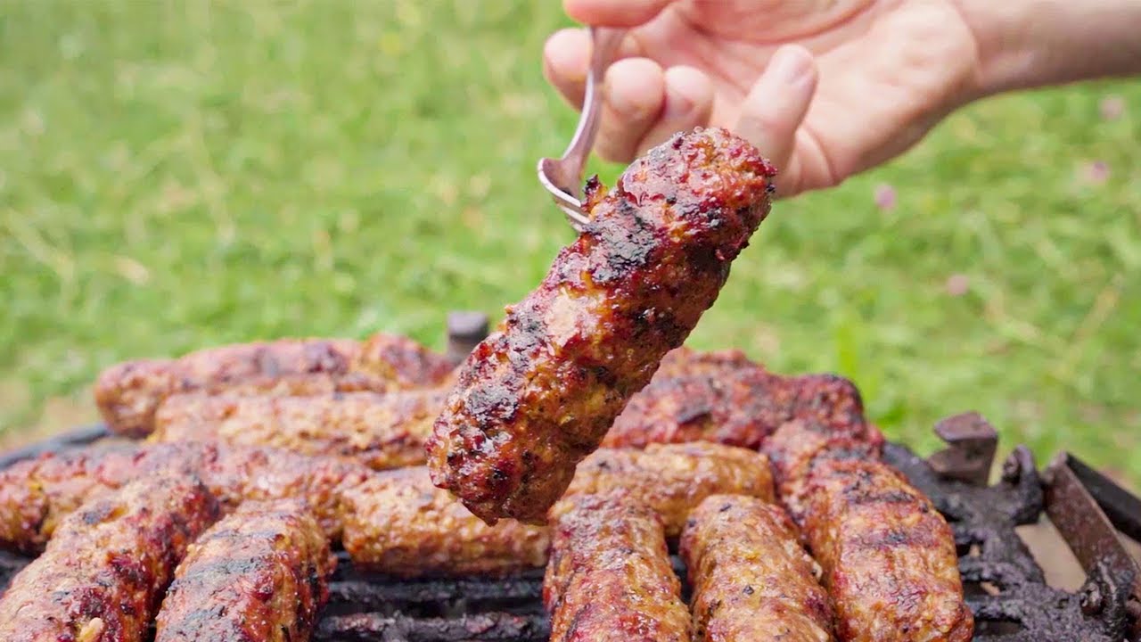 rustic mici cooked outdoors - YouTube