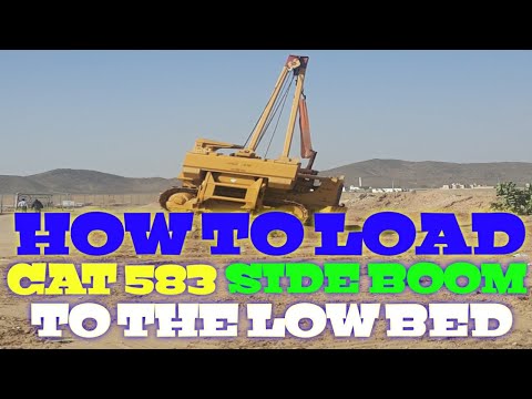 HOW TO LOAD CAT583 SIDE BOOM TO THE LOW BED - YouTube
