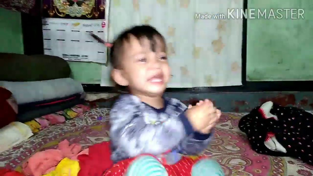 Baby crying for mobile when its taken away what a hilarious moment ...