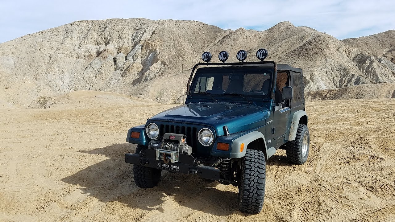 Noob rock crawling in my nearly stock 97 Jeep TJ - YouTube