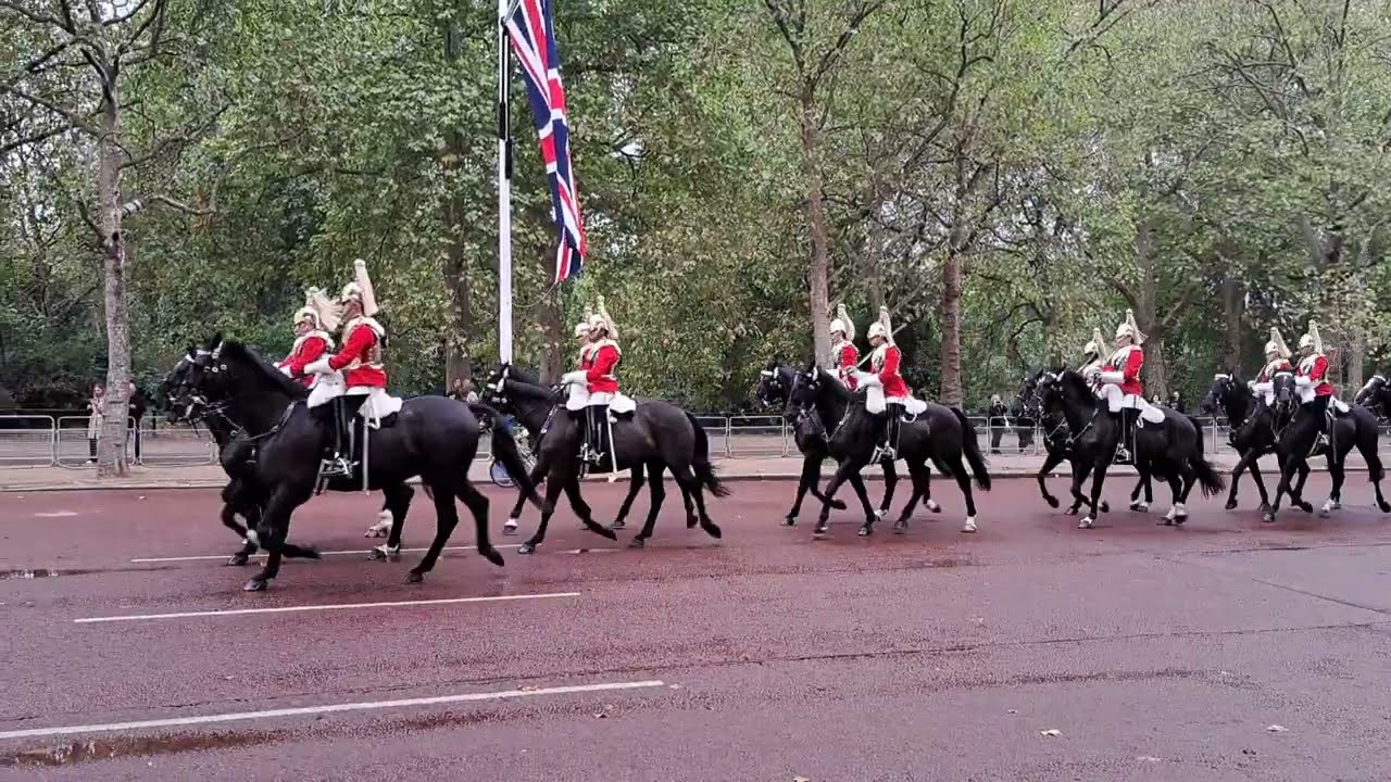 Kings guards on horse back The reds trotting down the mall # ...