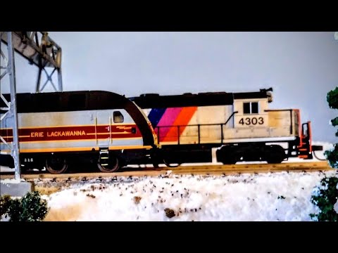 winter sunset NJT push-pull trains in snow and urban... N scale - YouTube