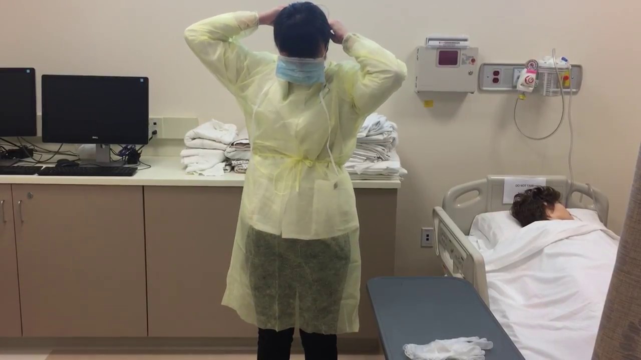 How to properly put on and take off PPE - YouTube