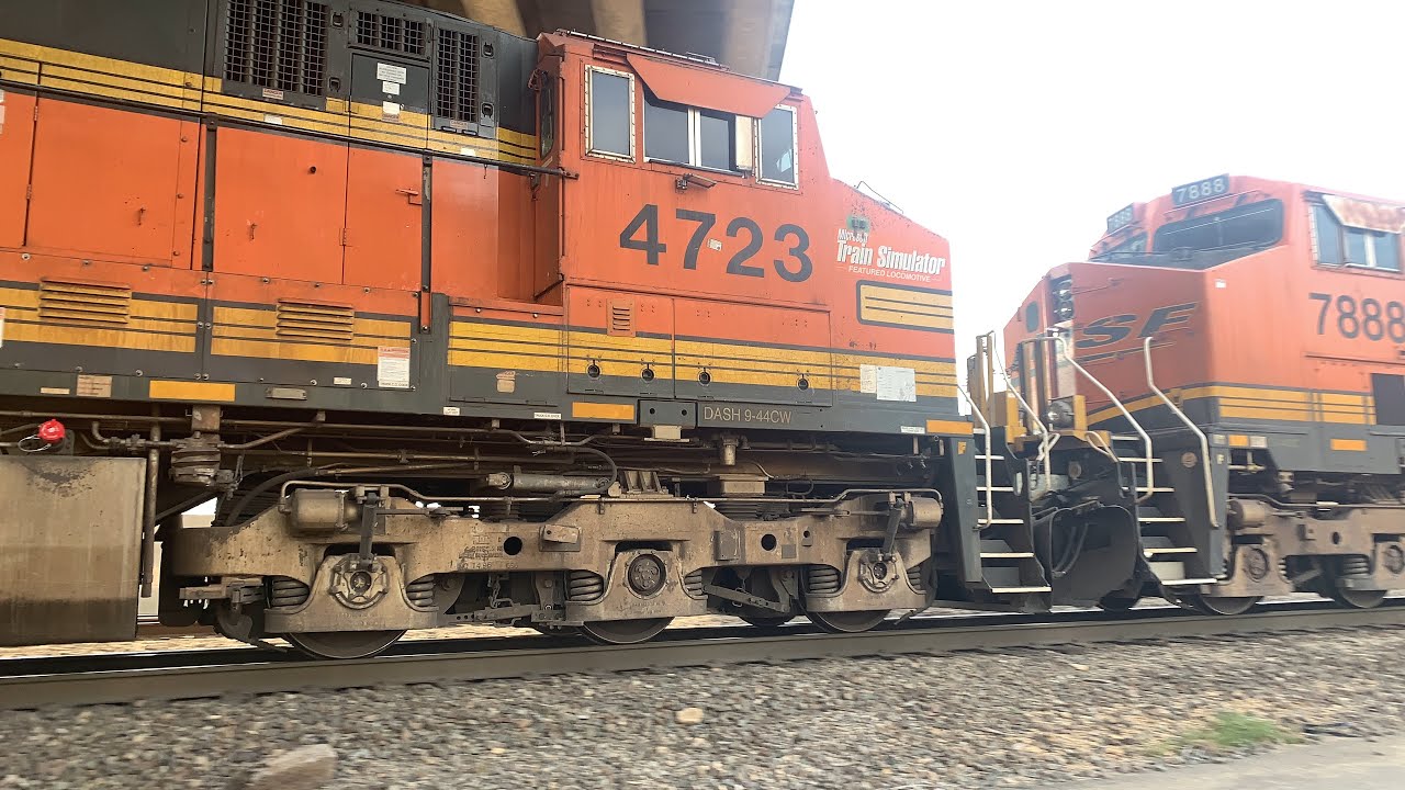BNSF 4723 Trails on a Northbound Grain train - YouTube