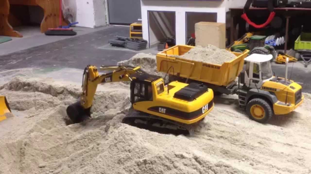 Bruder CAT Bagger beladet Dumper - YouTube