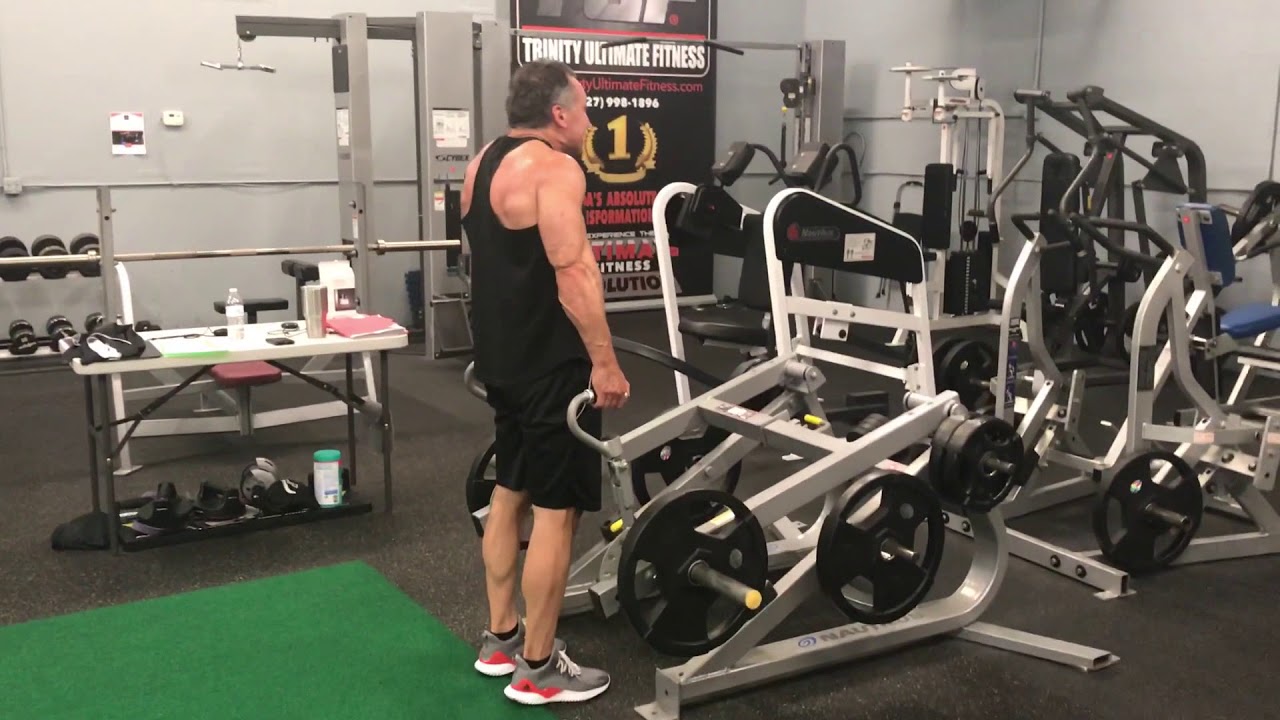 Back Shrug Nautilus Plate Loaded - YouTube