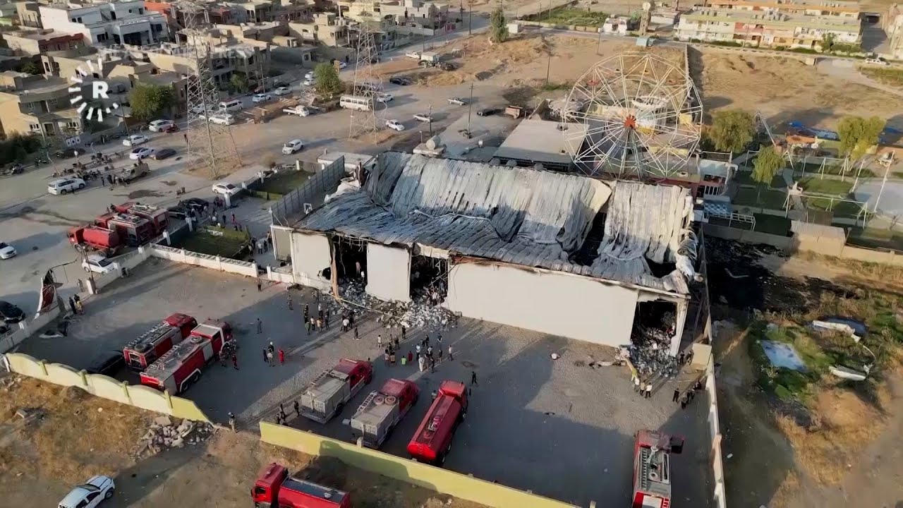 Wedding fire kills more than 100 in Iraq - YouTube