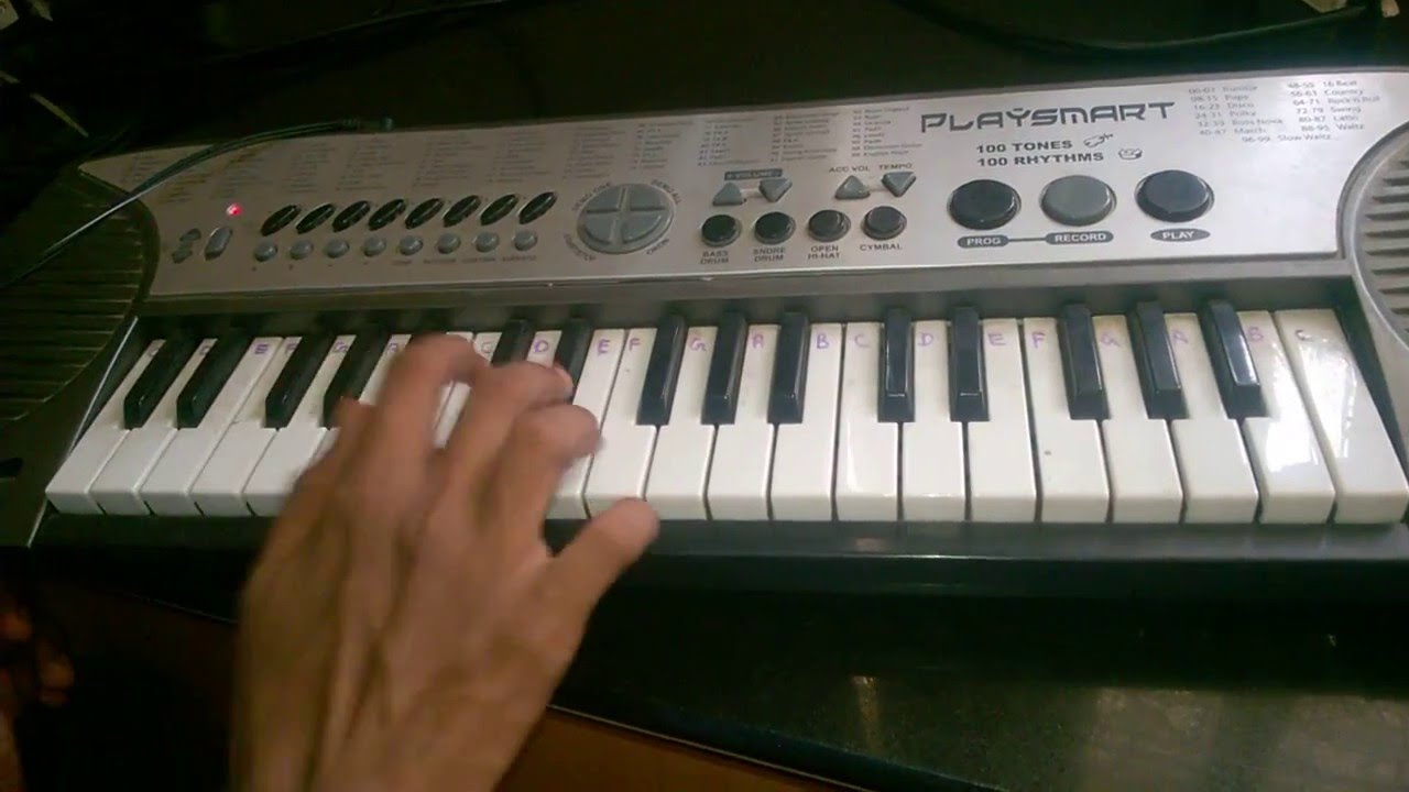 James Bond theme song in keyboard with notes - YouTube