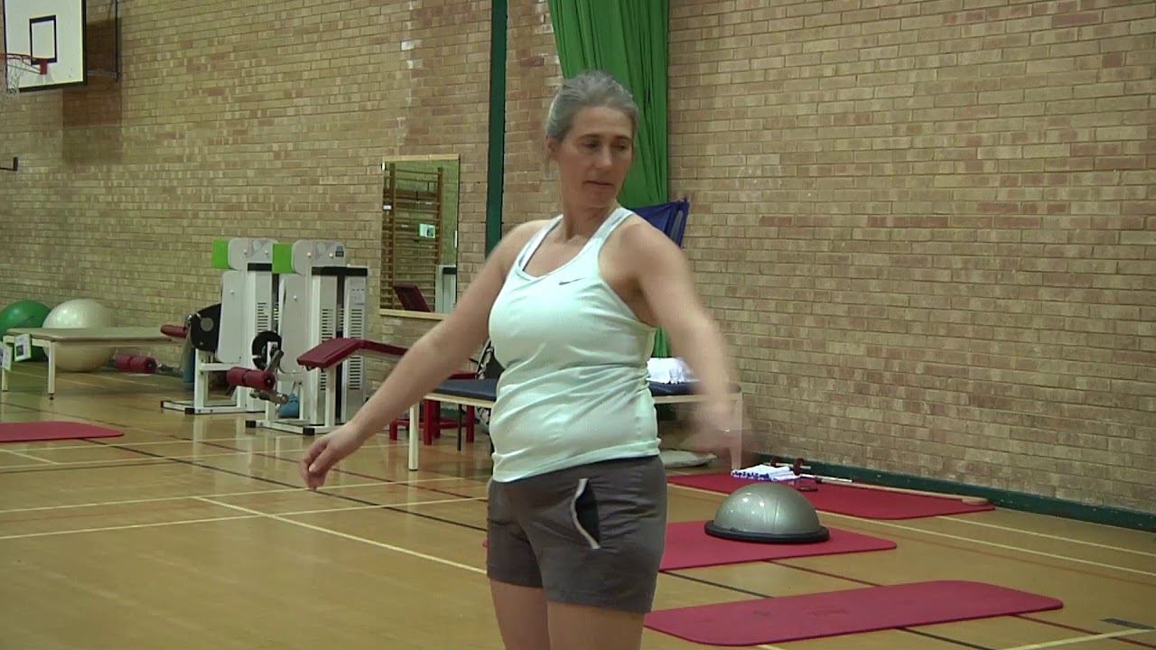 Spinal rotation in standing - YouTube