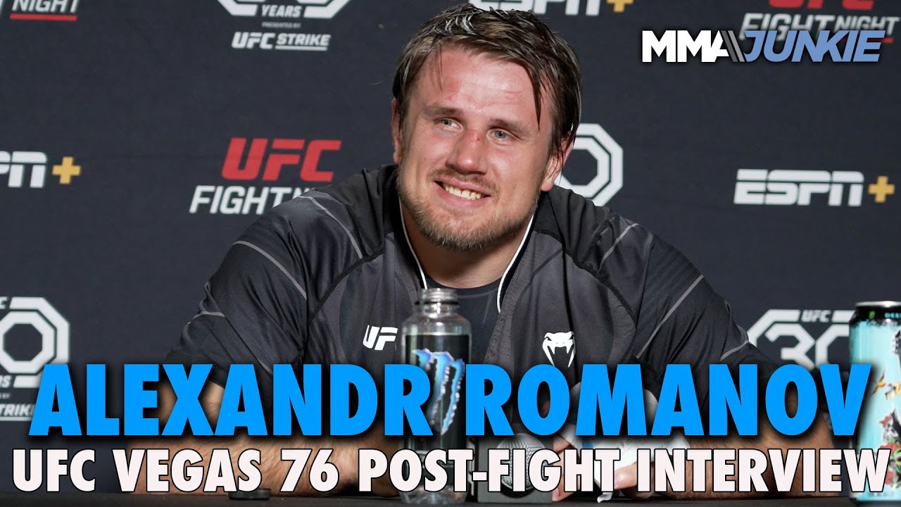 Alexandr Romanov overcomes early hand injury to get unanimous victory ...