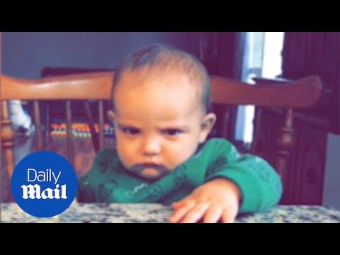 Baby gives the death stare after being sprayed with water - Daily Mail ...