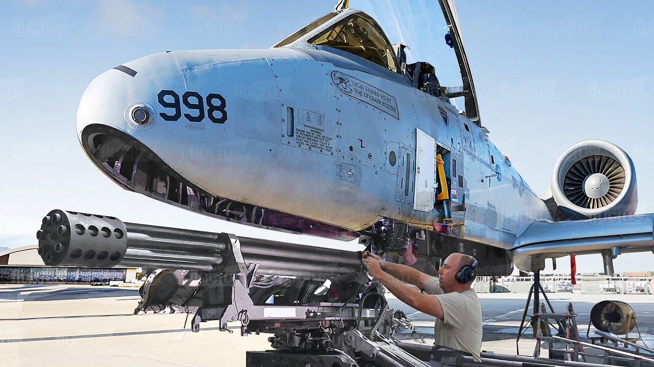 The Weird Process of Installing the Massive GAU-8 Gatling Gun - YouTube