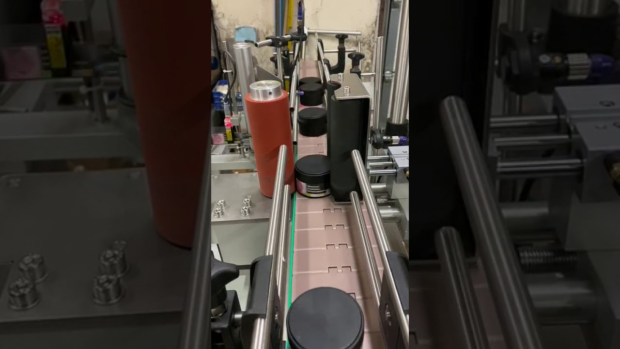 Automatic C-wrap labeller with rotary box. - YouTube