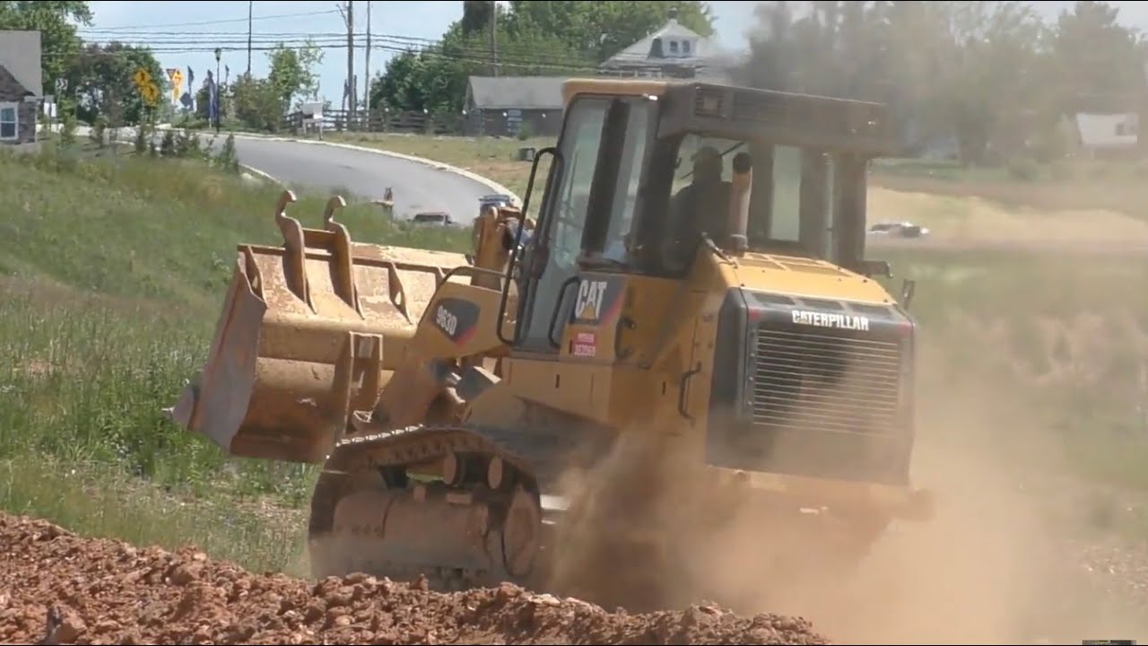 CAT 963D Track Loader Moving Stone - YouTube