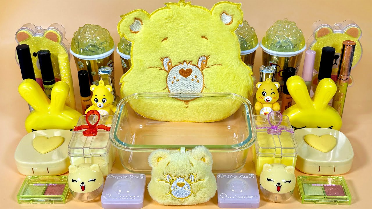 YELLOW SLIME | Mixing makeup and glitter into Clear Slime. Satisfying ...